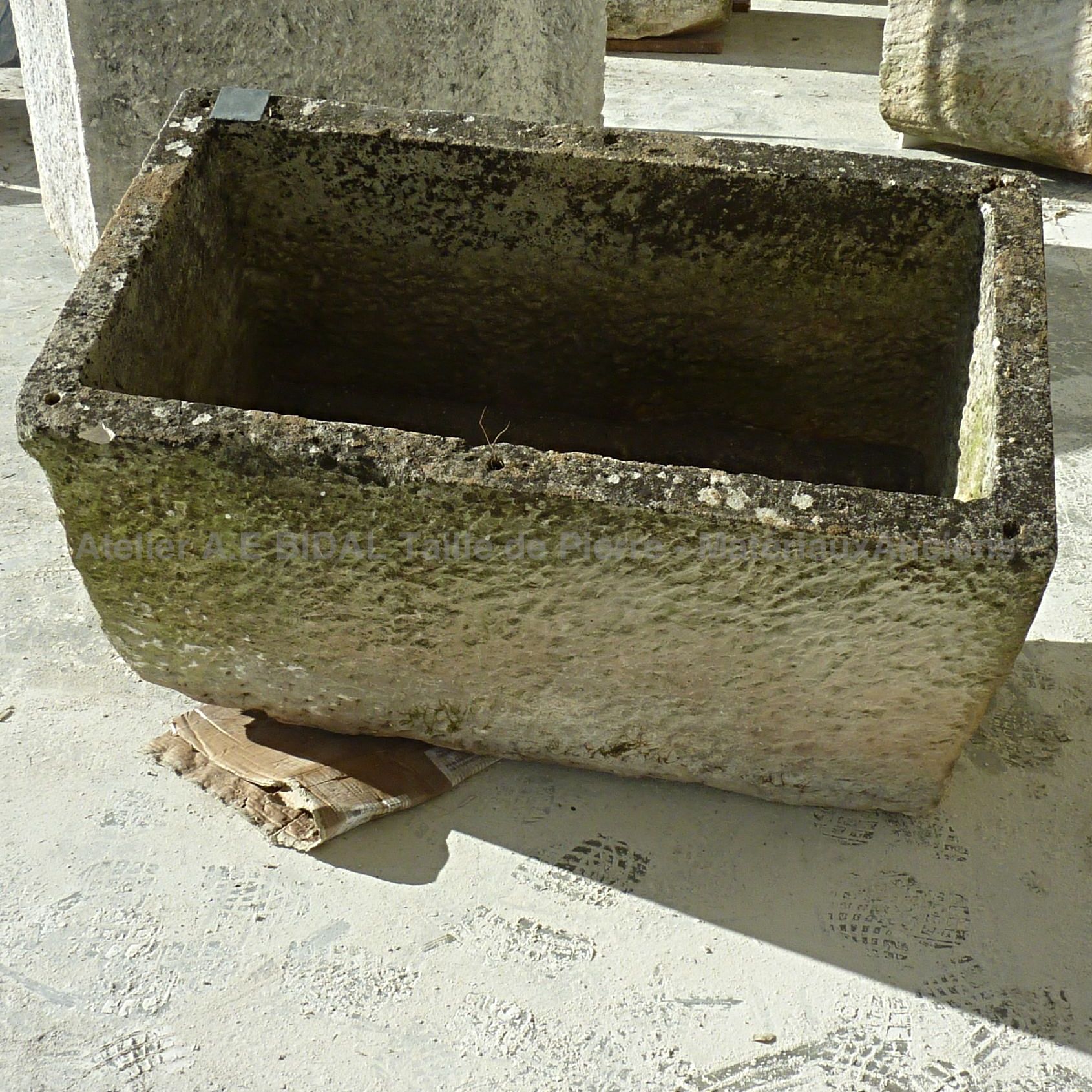 Antique rectangular massive stone trough with patina
