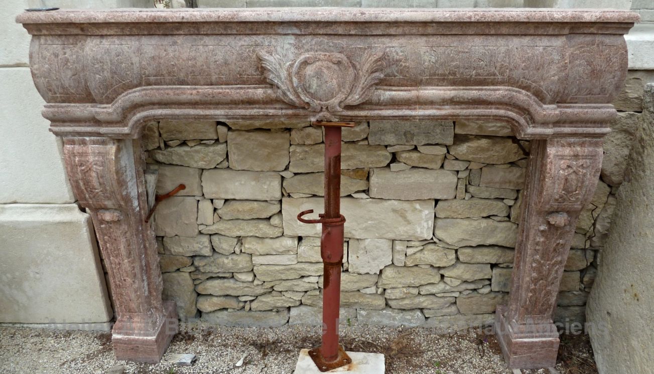 Magnificent Renaissance fireplace - a beautiful pink marble fireplace.